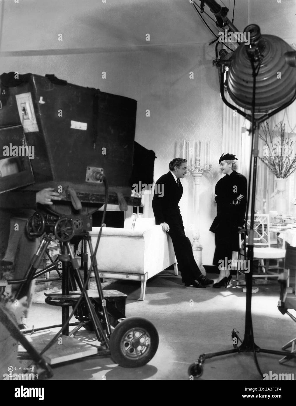 JOHN BARRYMORE as Oscar Jaffe and CAROLE LOMBARD as Lily Garland on set ...