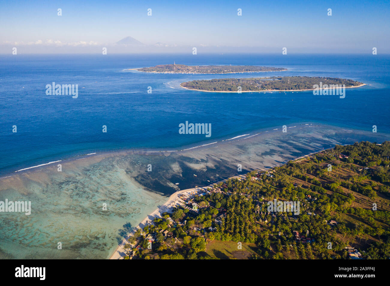 Aerial view of the three Gili islands, Meno, Air and Trawangan in ...