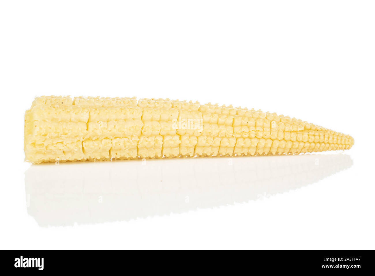 One whole baby yellow corn isolated on white background Stock Photo - Alamy