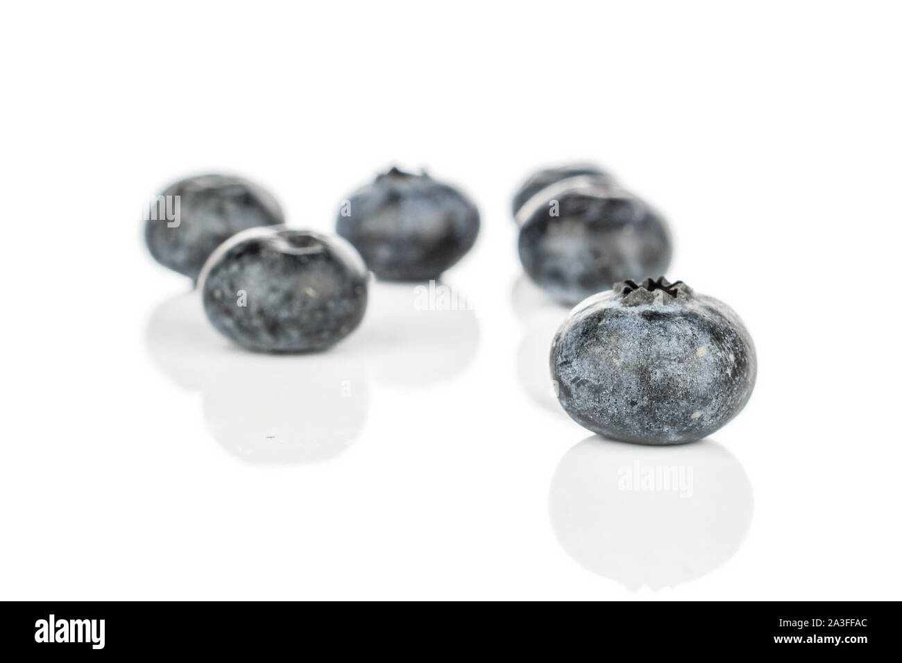 Group of six whole fresh blue blueberry isolated on white background ...