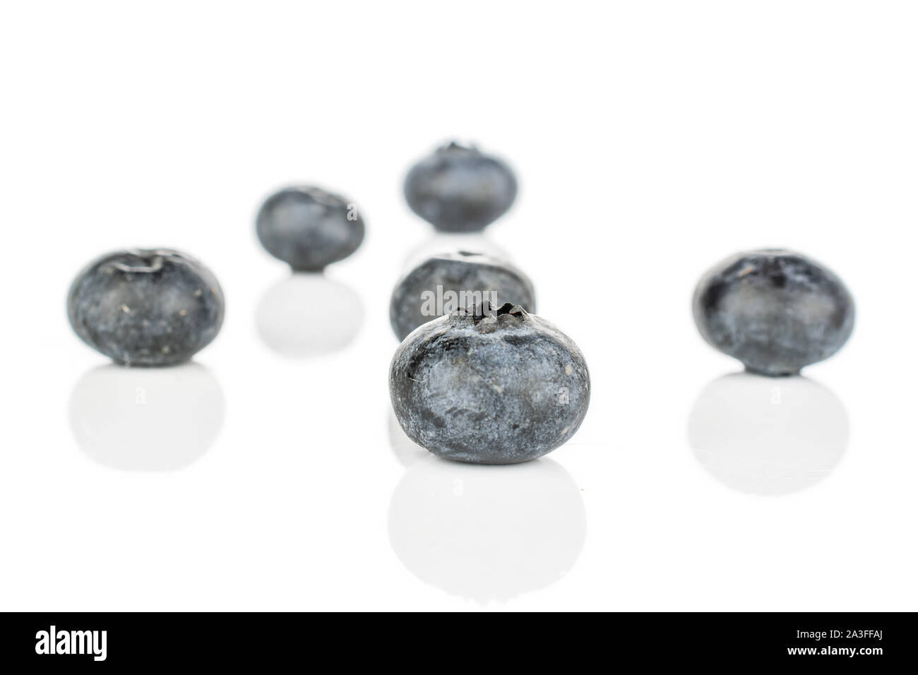 Group of six whole fresh blue blueberry isolated on white background ...