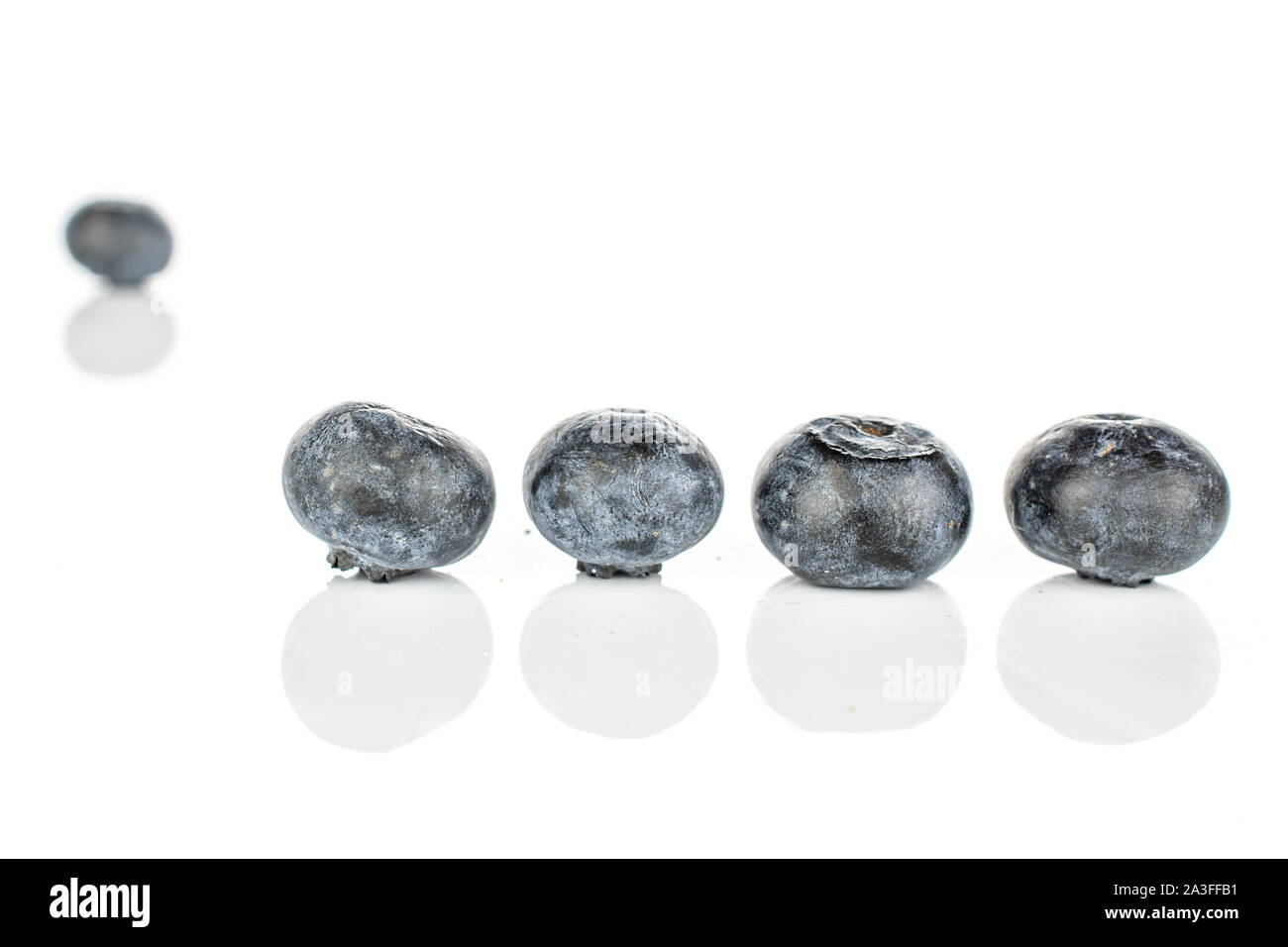 Group of five whole fresh blue blueberry isolated on white background ...