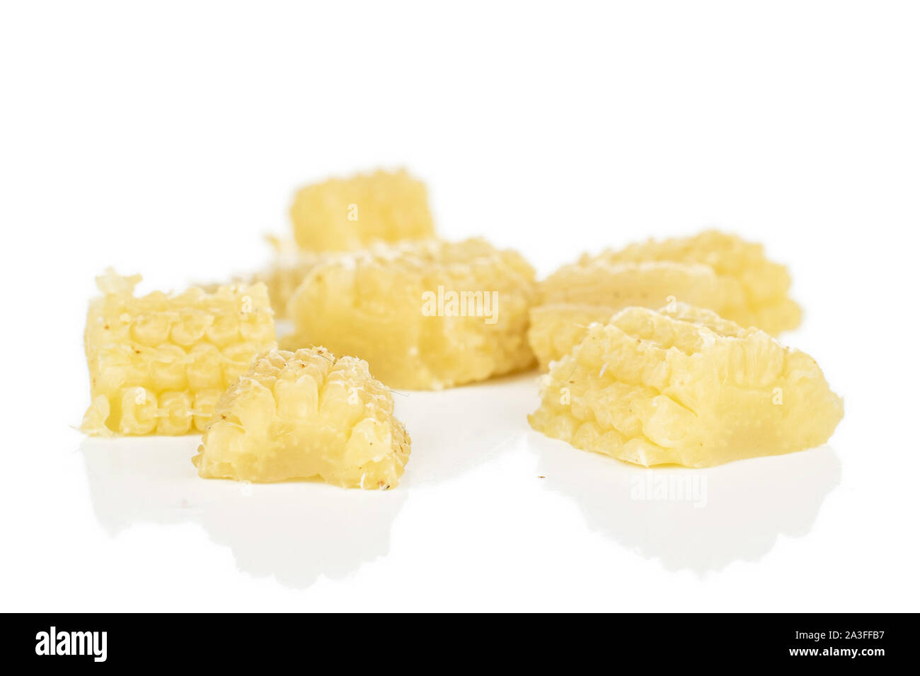 Group of six pieces of baby yellow corn isolated on white background ...