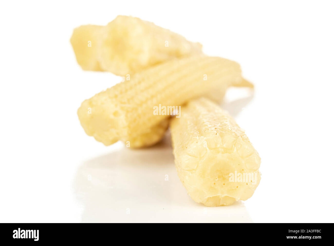 Group of five whole baby yellow corn isolated on white background Stock ...
