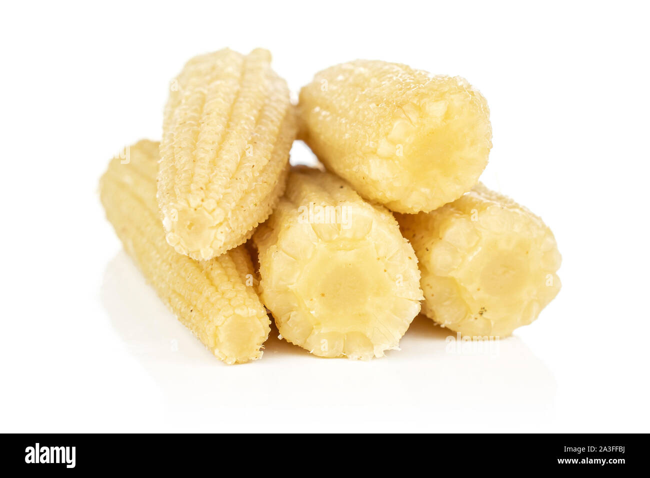 Group of five whole baby yellow corn isolated on white background Stock ...