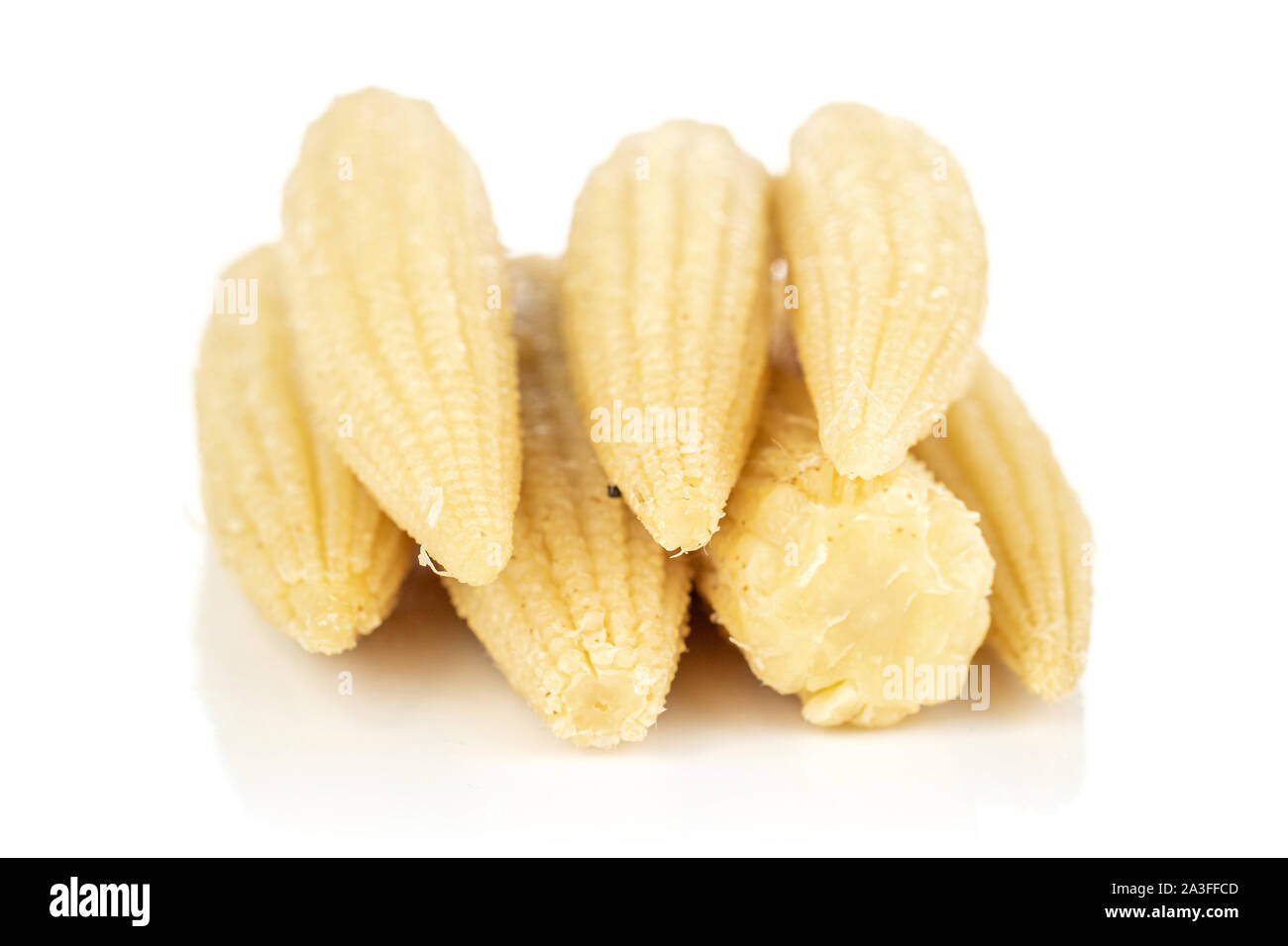 Group of six whole baby yellow corn isolated on white background Stock ...