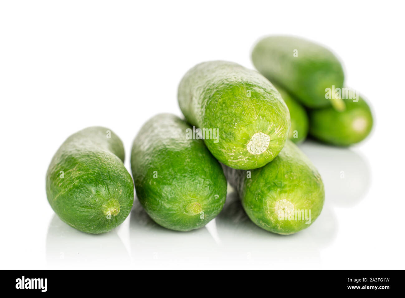 Group of six whole mini green cucumber isolated on white background ...