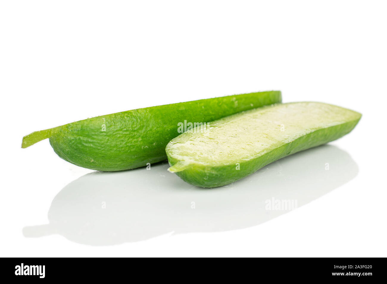 Group of one half one piece of mini green cucumber isolated on white ...