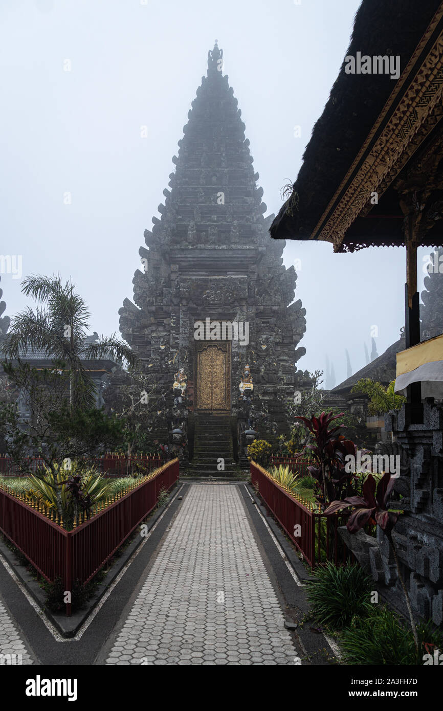 The Pura Ulun Danu Batur Balinese Hinduism temple on a foggy day in ...