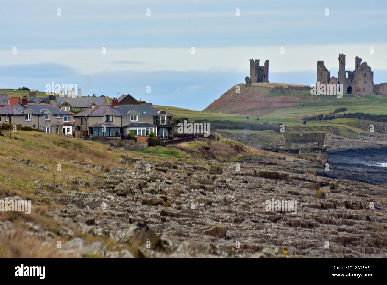 Dunstanburgh Castle and Craster, Northumberland Stock Photo - Alamy