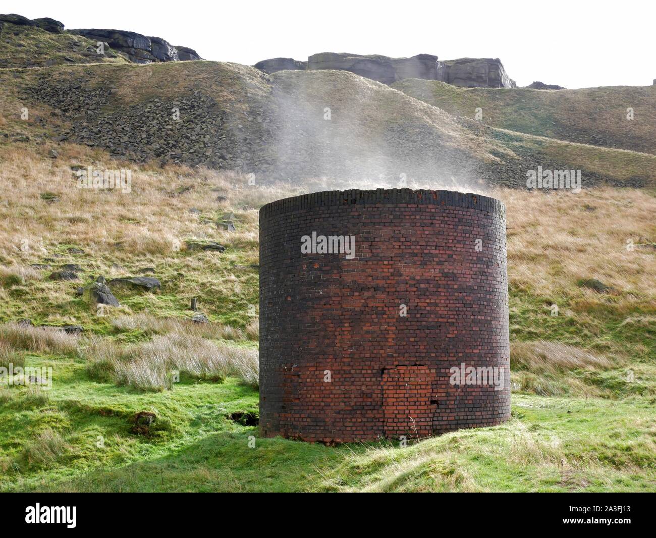 Standedge Tunnel ventilation chimney high on the pennines smoking as a ...