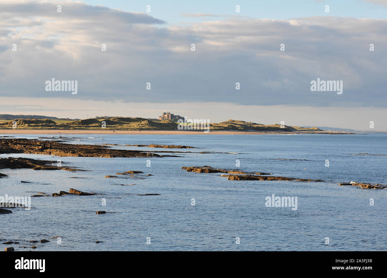 Bamburgh castle from Seahouses Stock Photo - Alamy