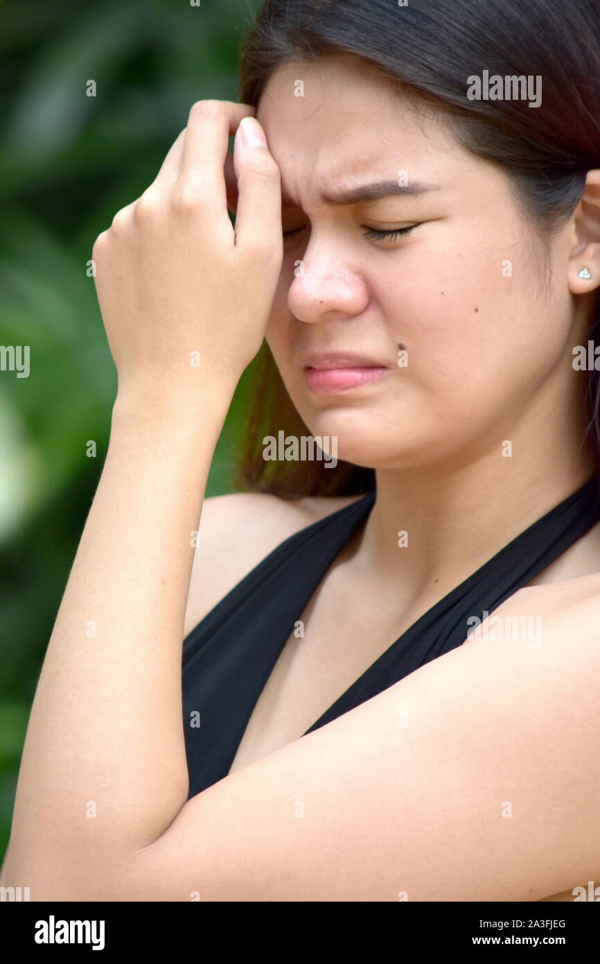 A Young Adult Female And Worry Stock Photo - Alamy