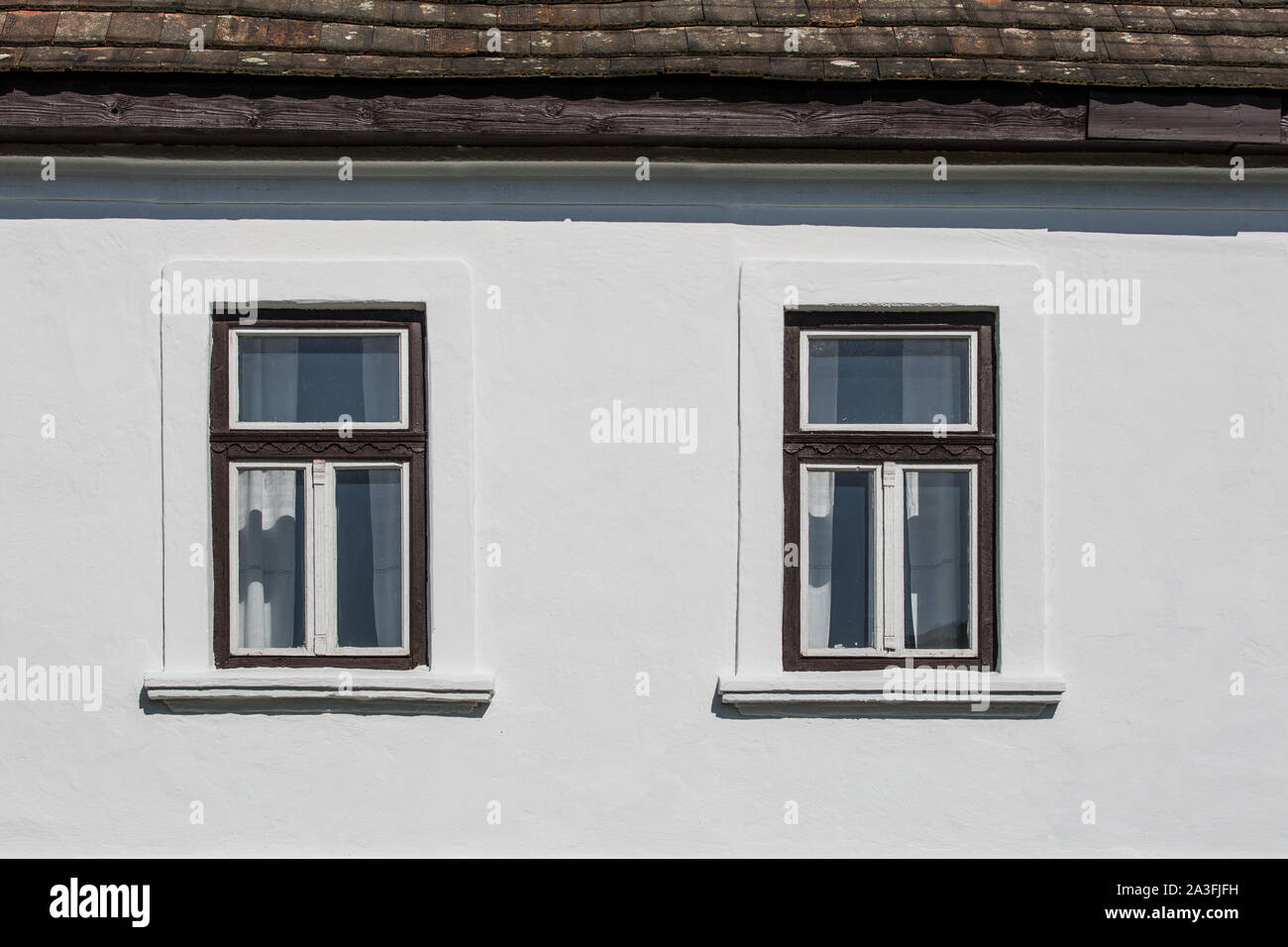 Windows and doors on village houses Stock Photo - Alamy