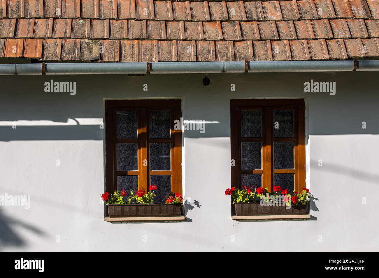 Windows and doors on village houses Stock Photo - Alamy