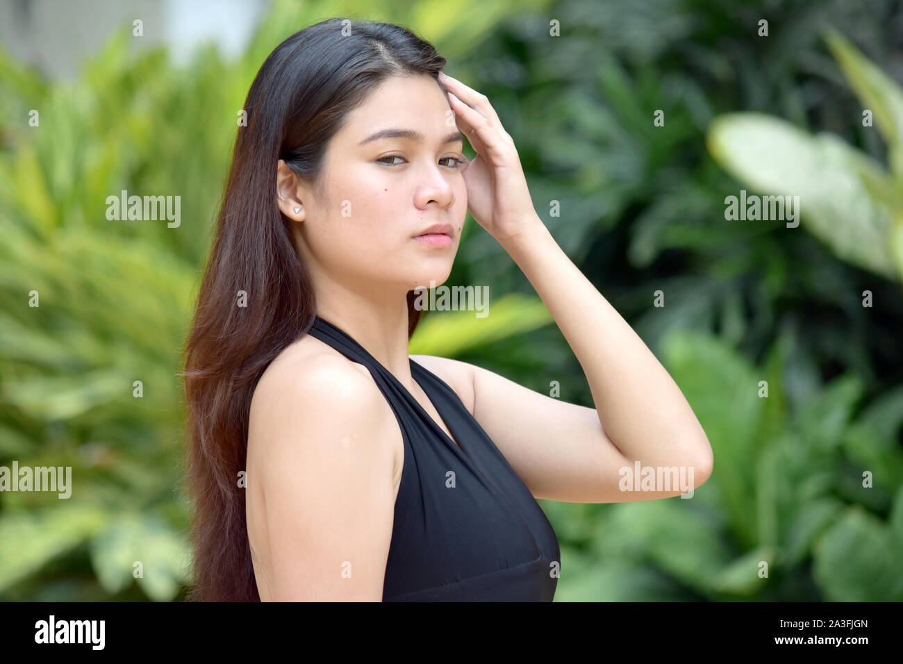 Serious beautiful filipina person hi-res stock photography and images ...