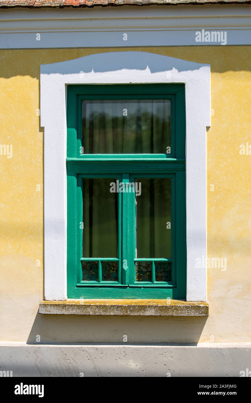 Windows and doors on village houses Stock Photo - Alamy