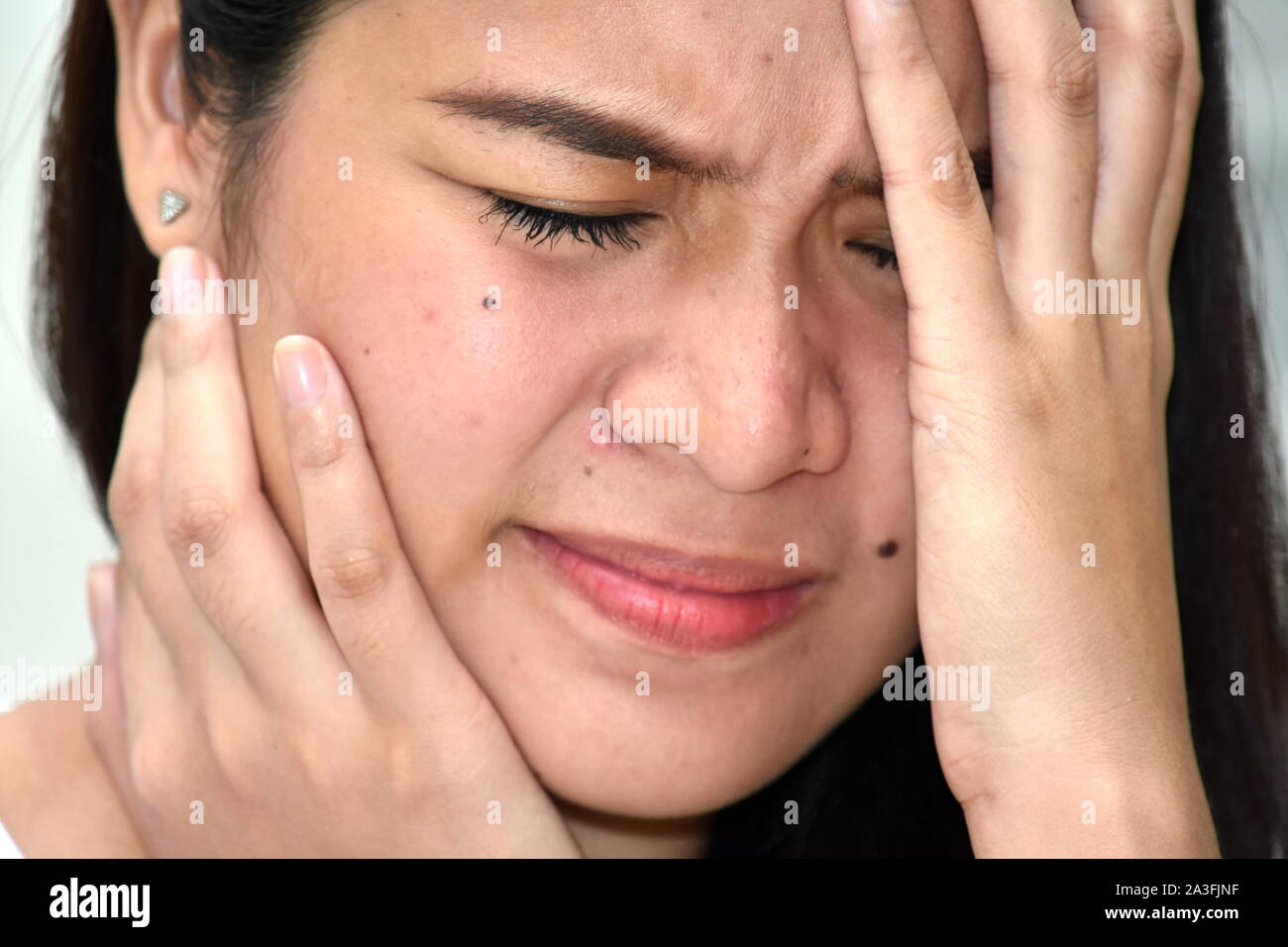 A Stressful Filipina Female Stock Photo - Alamy