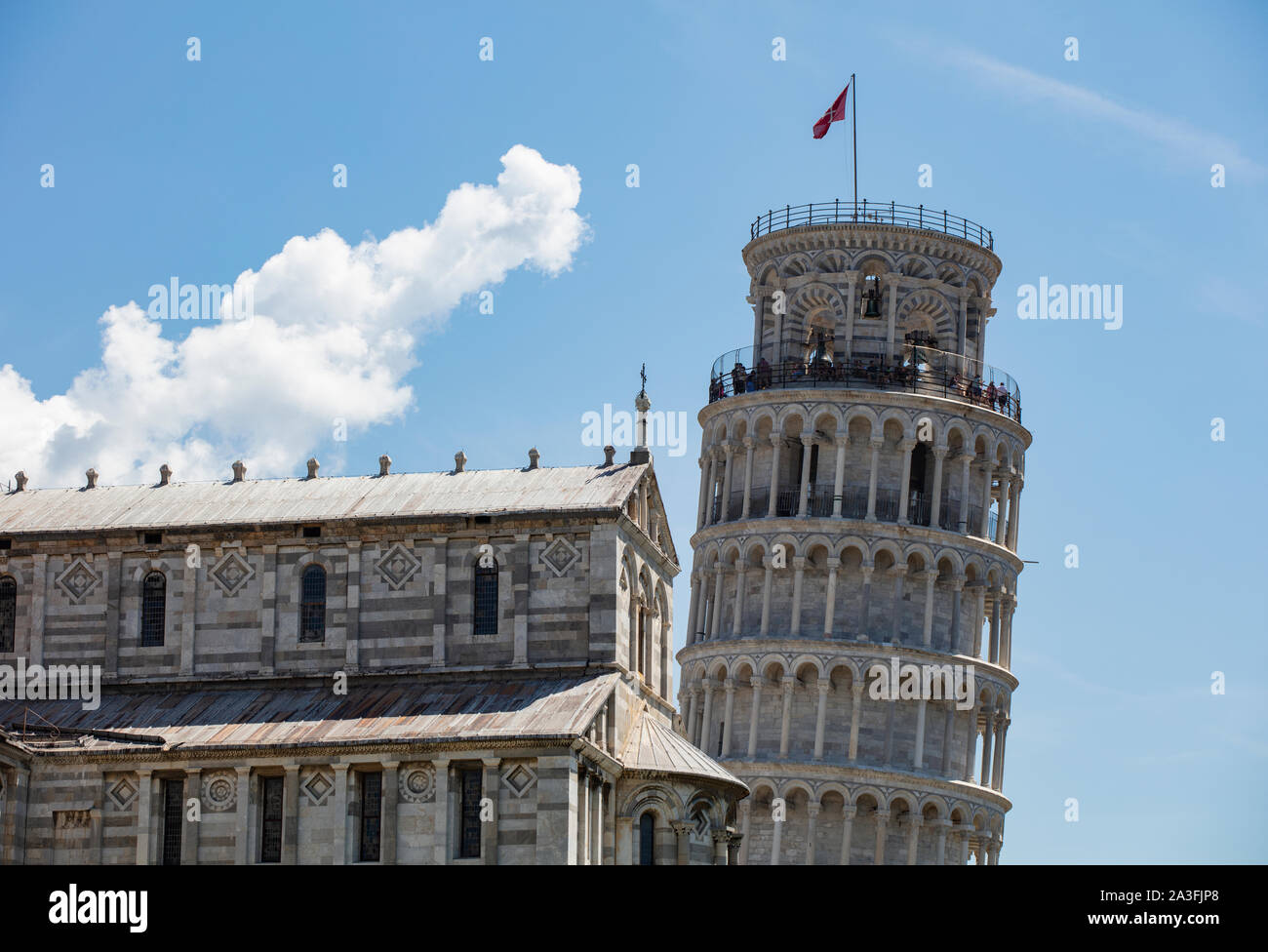 A view of the leaning tower of Pisa and the cathedral on the Campo dei ...