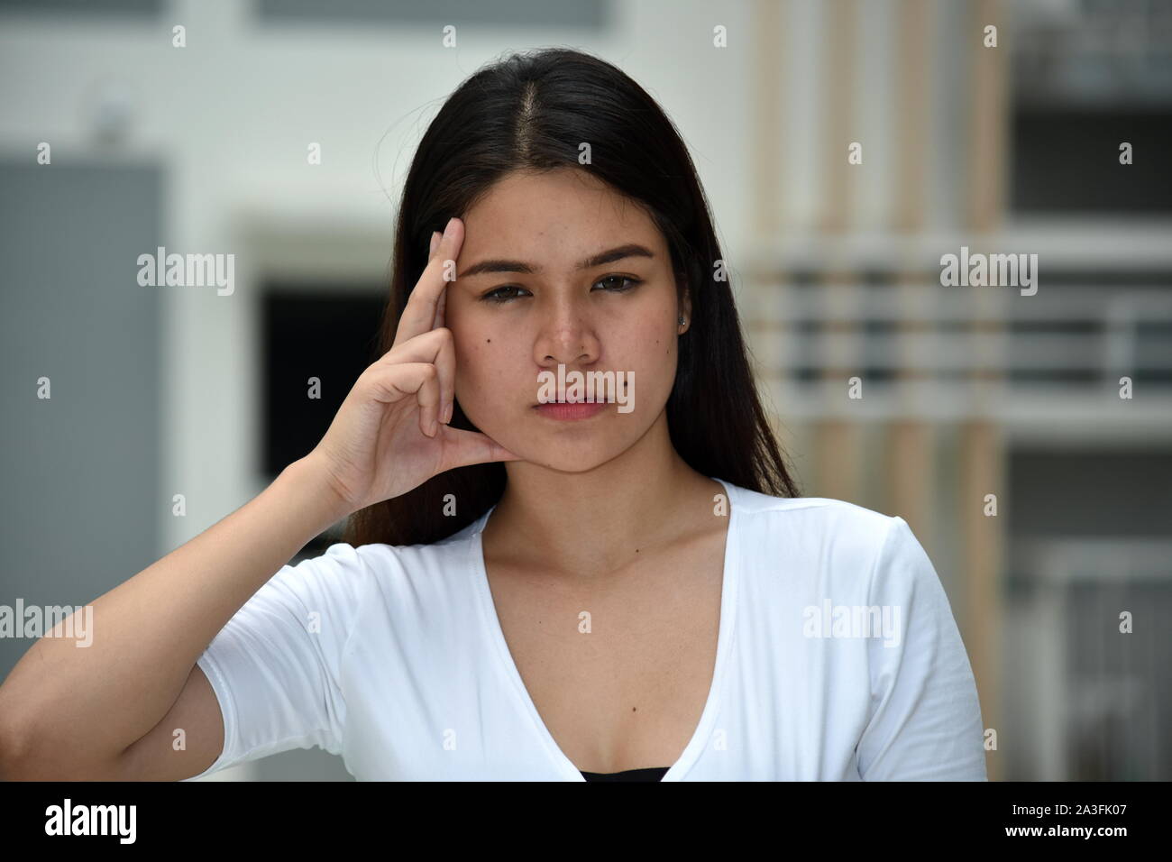 A Young Asian Female Decision Making Stock Photo - Alamy