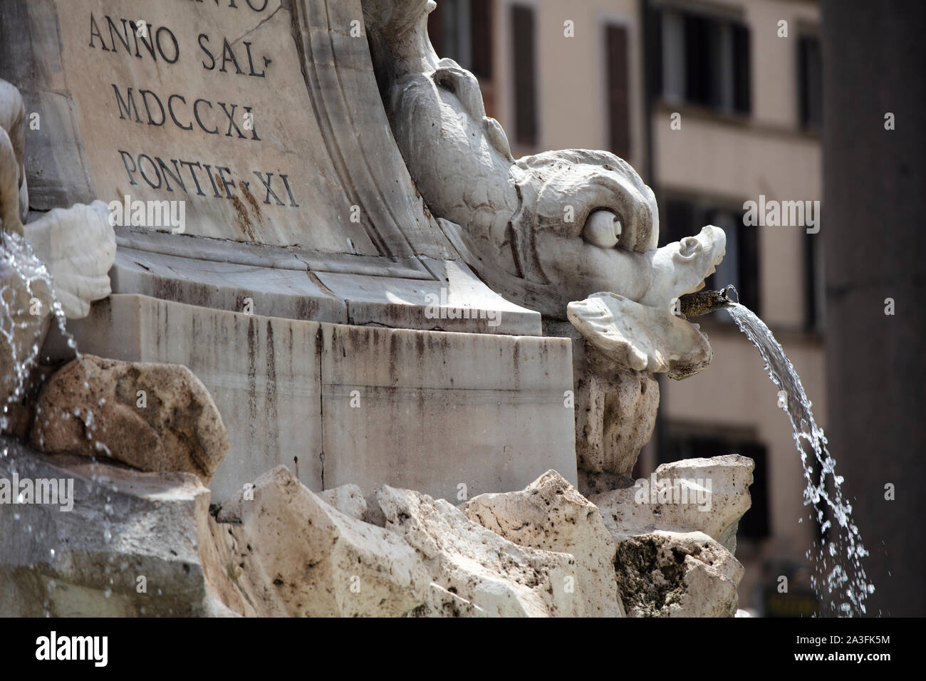 A dolphin water spout on the Fontana del Pantheon in Rome. In the ...