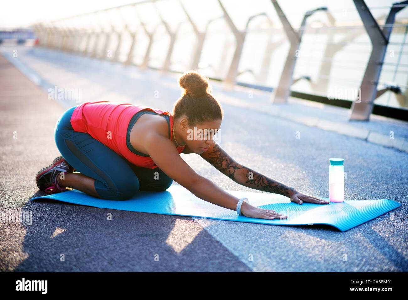 Woman back stretching arm hi-res stock photography and images - Alamy