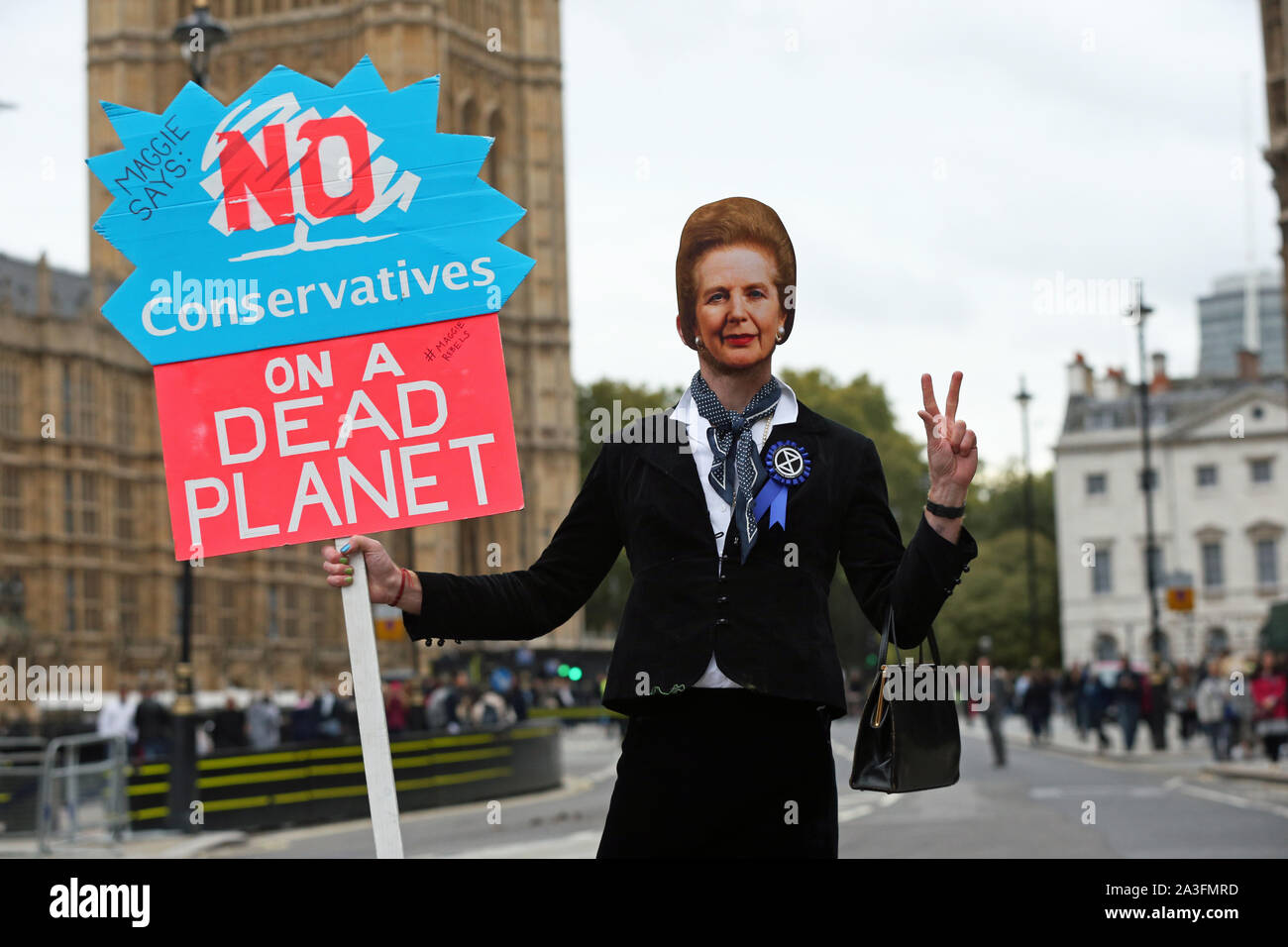 Protester wearing a Baroness Thatcher mask and outfit outside ...