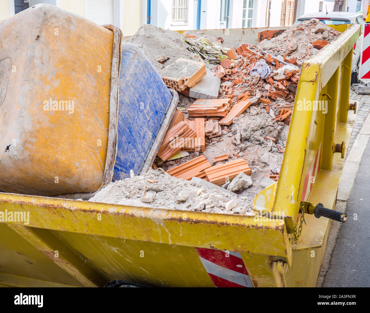 Container with rubble on a construction site Stock Photo - Alamy
