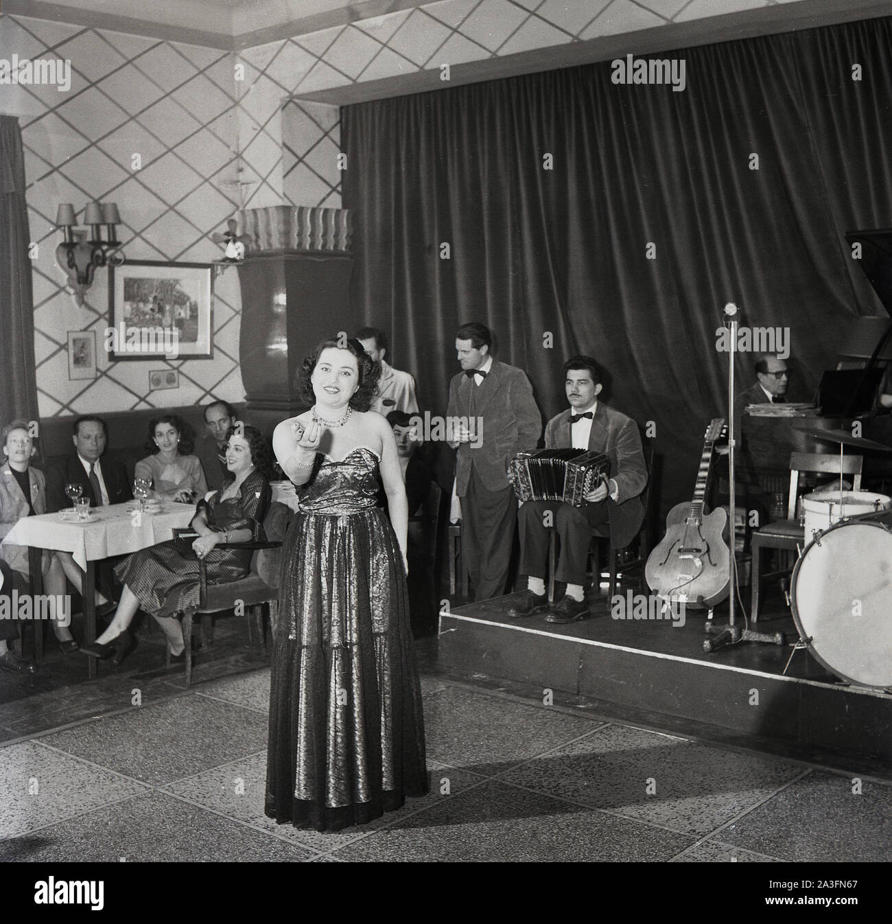 1950s, historical, inside a restaurant in Nice on the French Riveria, a ...