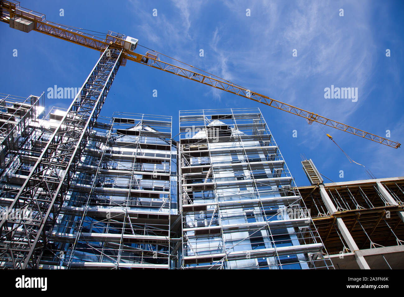 New building under construction. Front view Stock Photo - Alamy