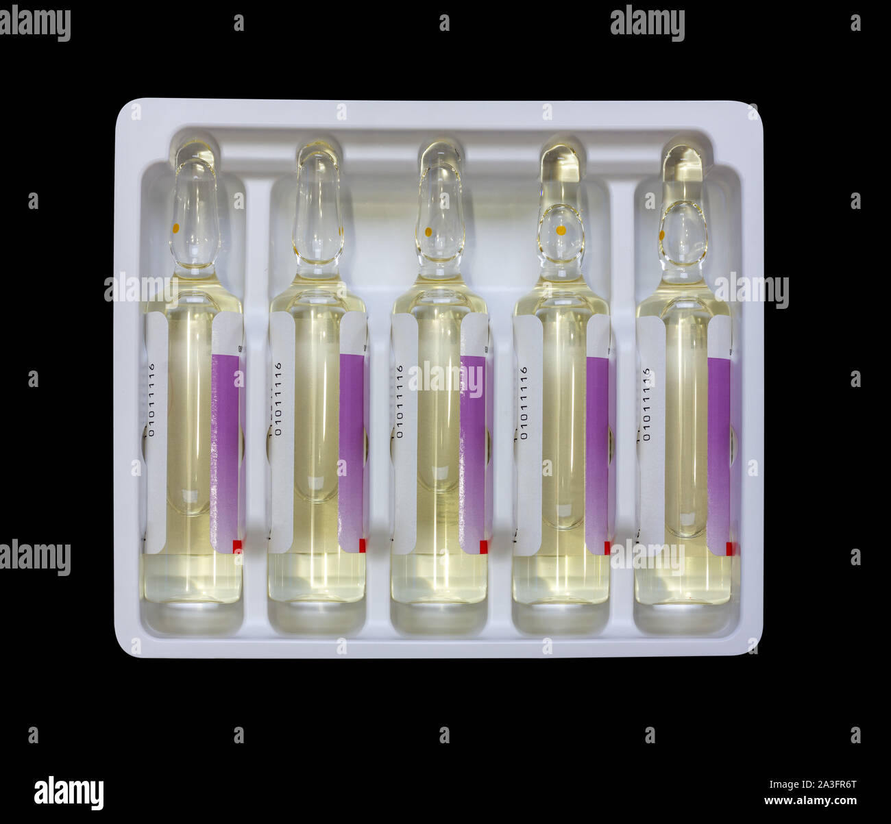 Packaging drugs in glass vials hi-res stock photography and images - Alamy