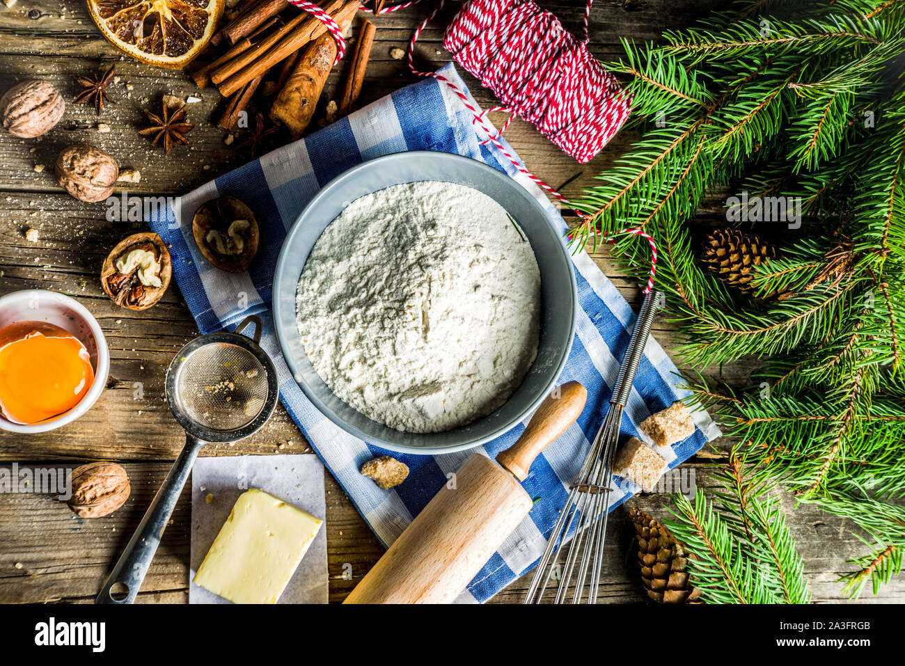 Christmas baking background with utensils and ingredients - flour, eggs ...