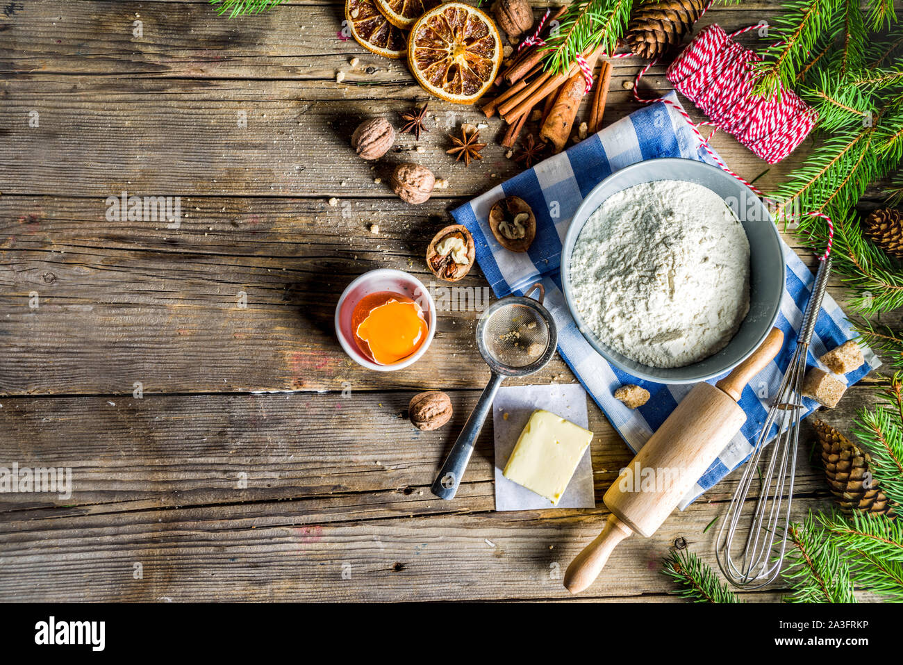 Christmas baking background with utensils and ingredients - flour, eggs ...