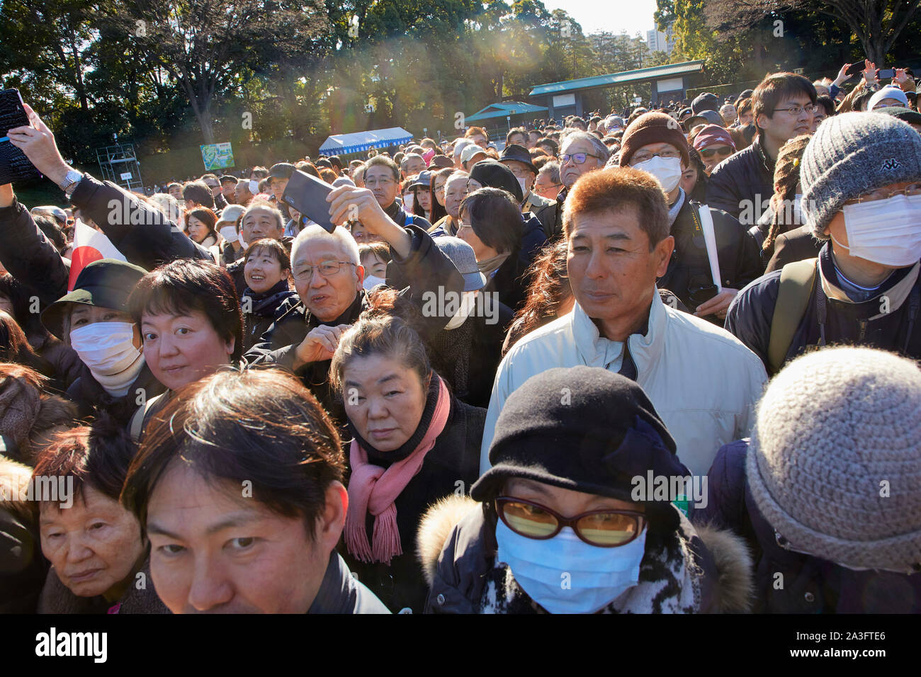 Japan Tokyo People walk to the Emperor palace where emperor Akihito ...