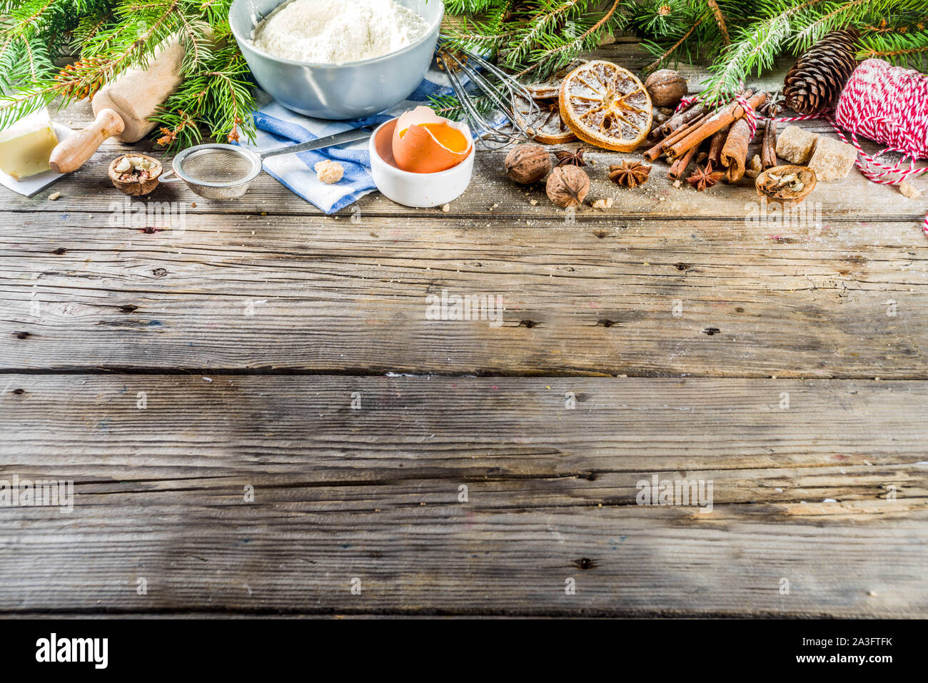 Christmas baking background with utensils and ingredients - flour, eggs ...