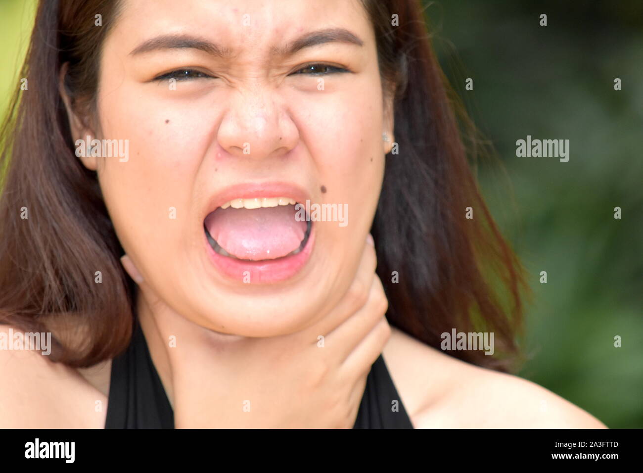 Choking woman hi-res stock photography and images - Alamy