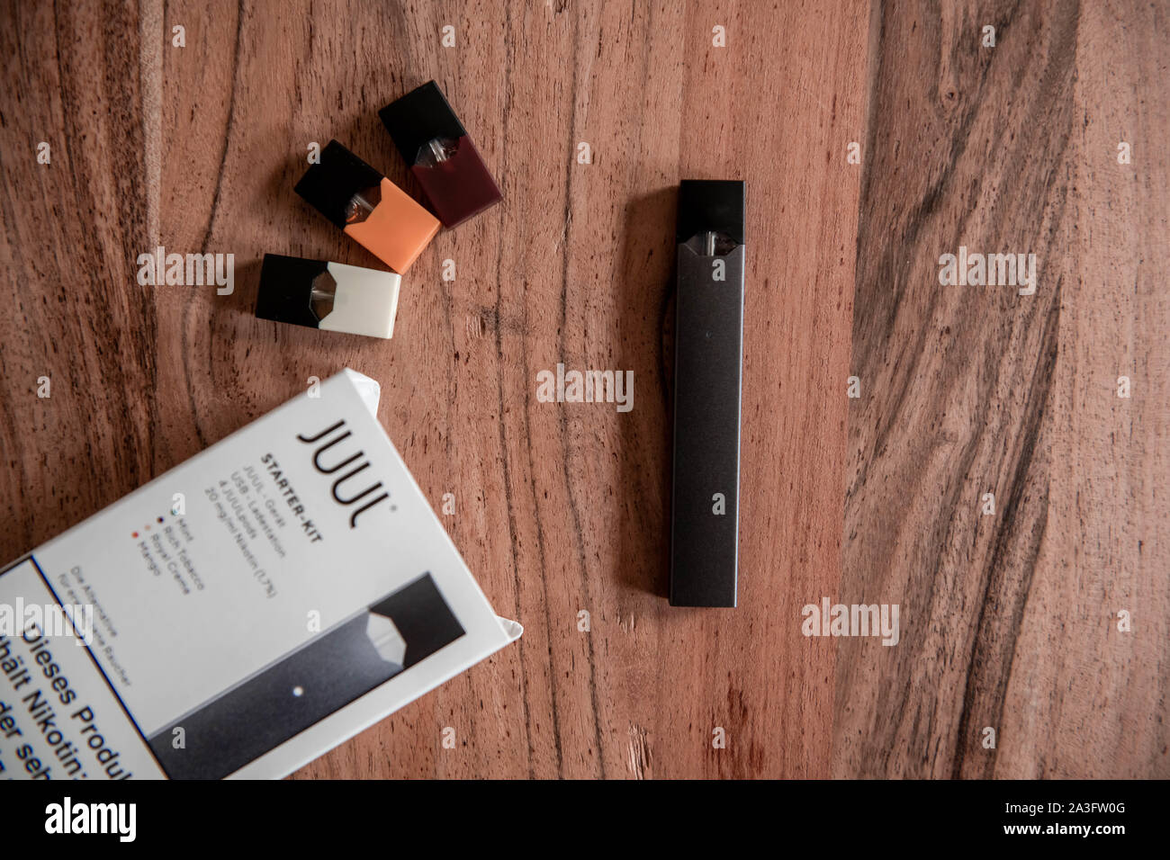 NRW/GERMANY - JUNE 11, 2019: A JUUL Starter Kit on a table. The company ...
