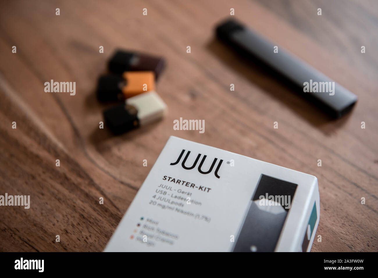 NRW/GERMANY - JUNE 11, 2019: A JUUL Starter Kit on a table. The company ...