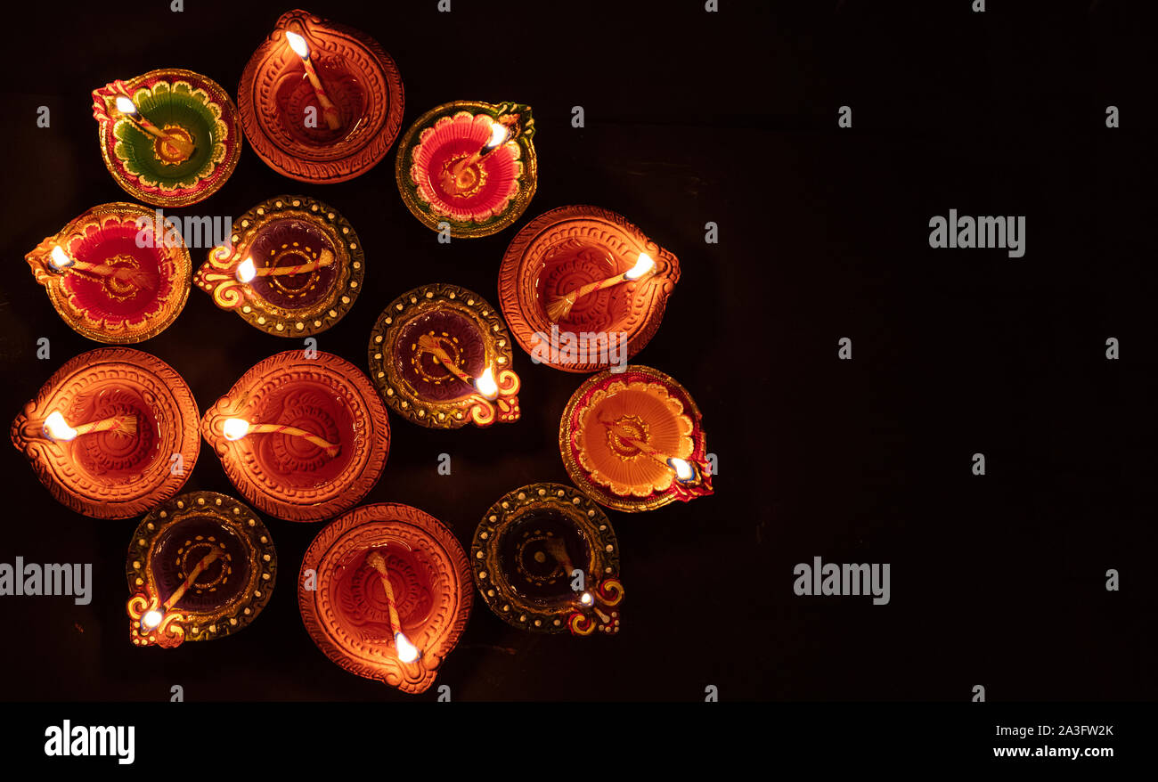 Diwali, Hindu festival of lights celebration. Clay diya candles ...