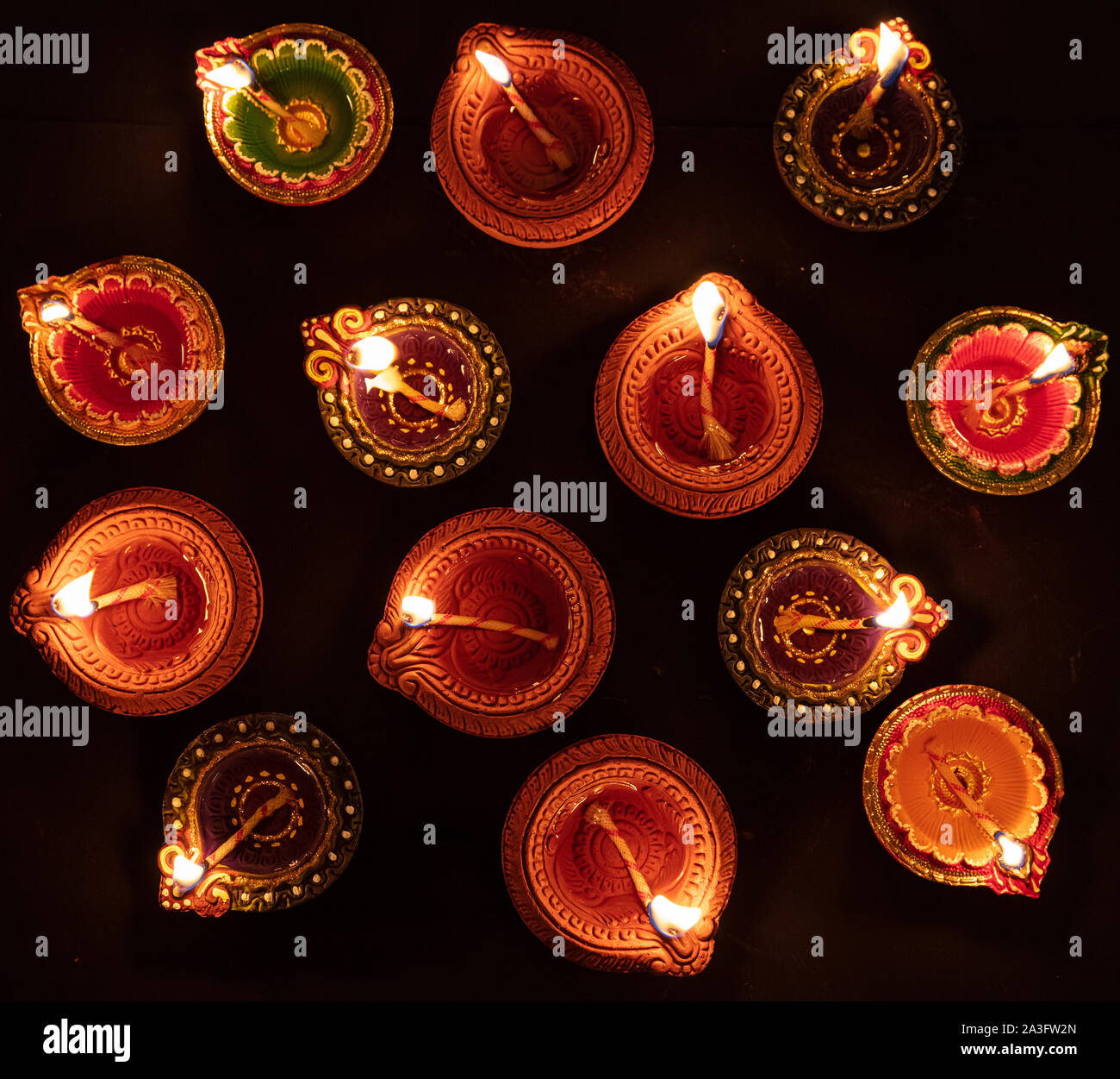 Diwali, Hindu festival of lights celebration. Clay diya candles ...