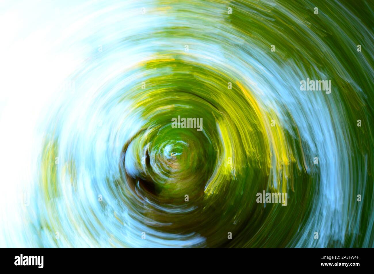 spinning effect in the forest. abstract background Stock Photo - Alamy