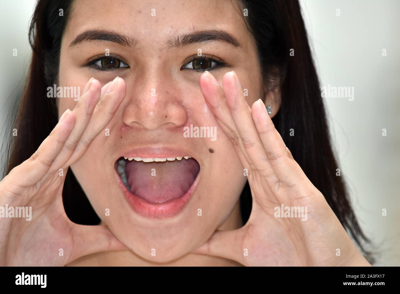 Asian young women shout hi-res stock photography and images - Alamy