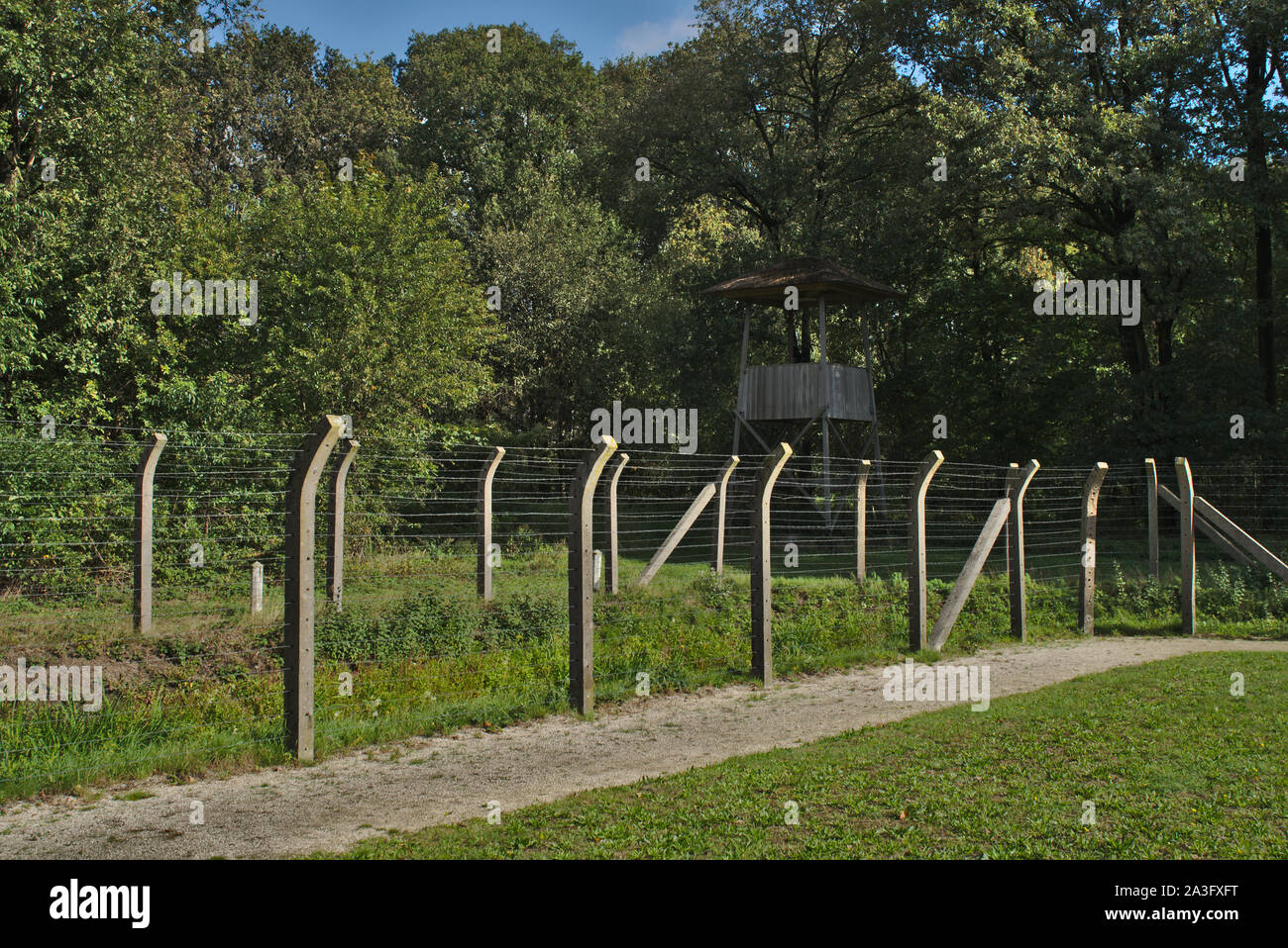 Wire fence and watch tower. Camp Vught National Monument. Netherlands ...