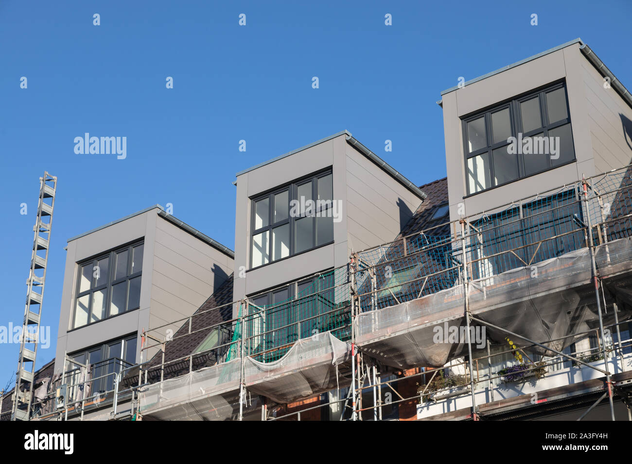 house improvement with three large dormers Stock Photo - Alamy