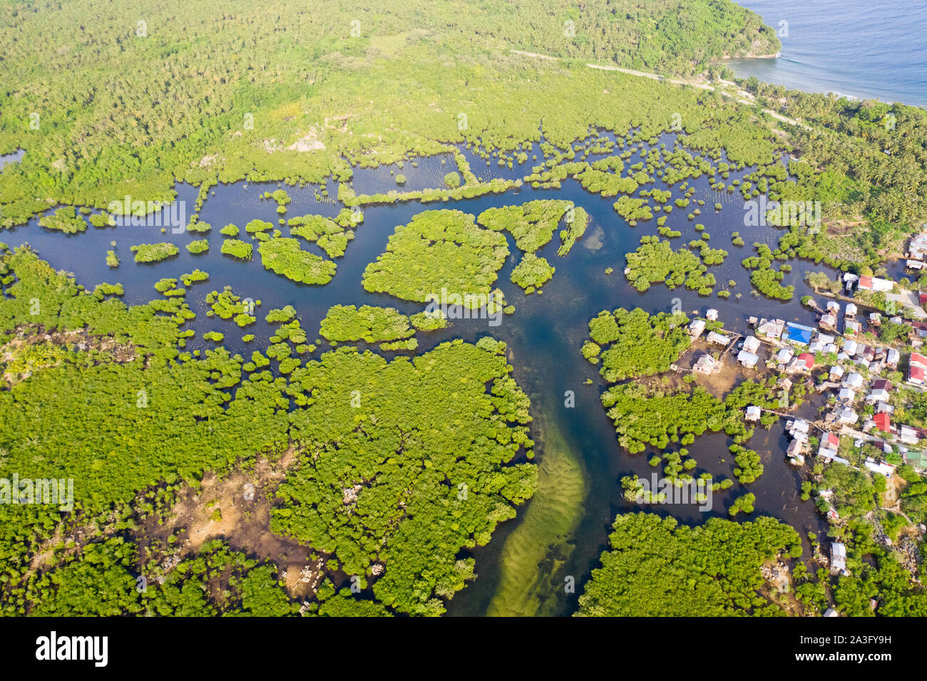 Town on the water and mangroves, top view. Coast of the island of ...