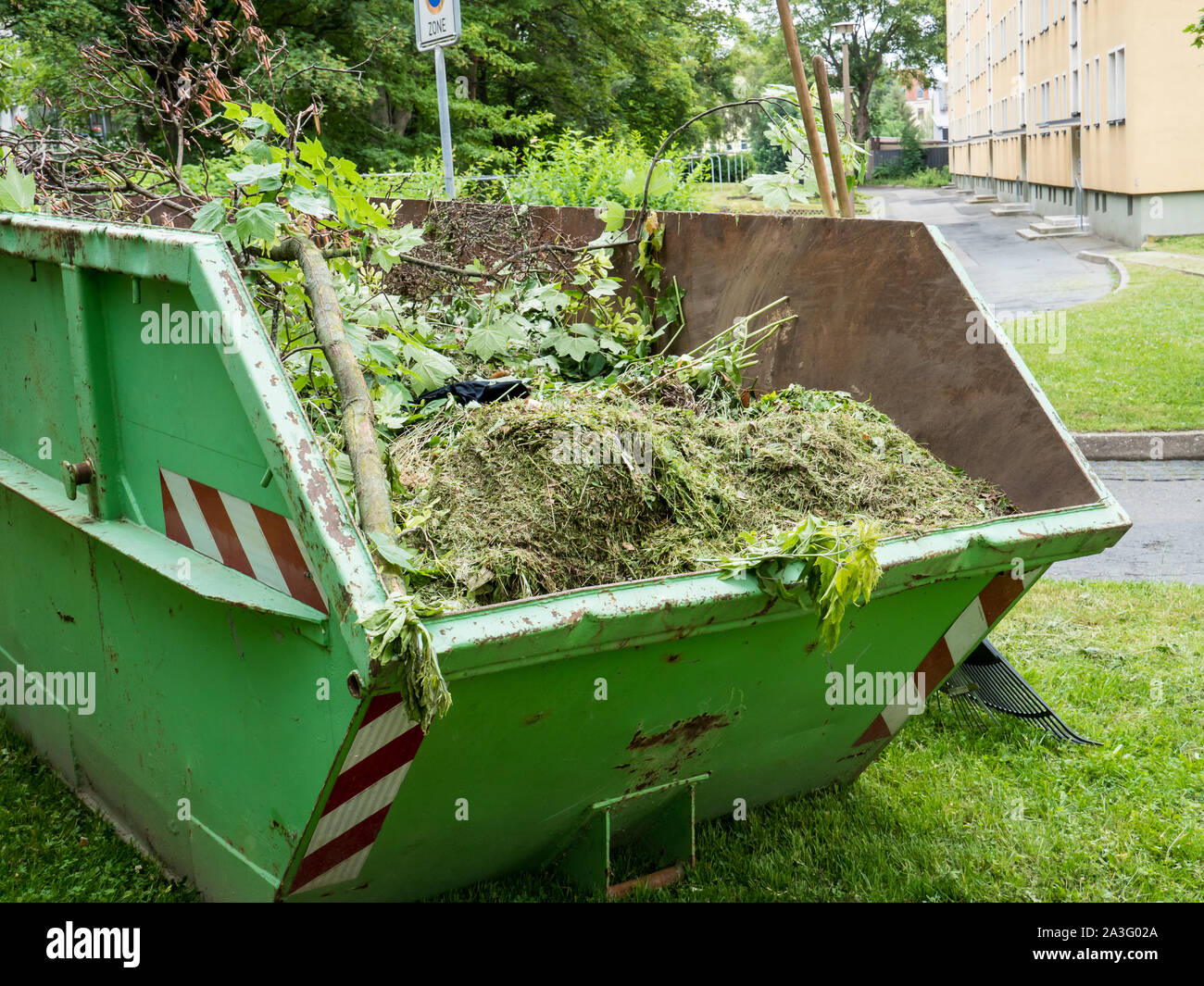 Container with green waste from green care Stock Photo - Alamy