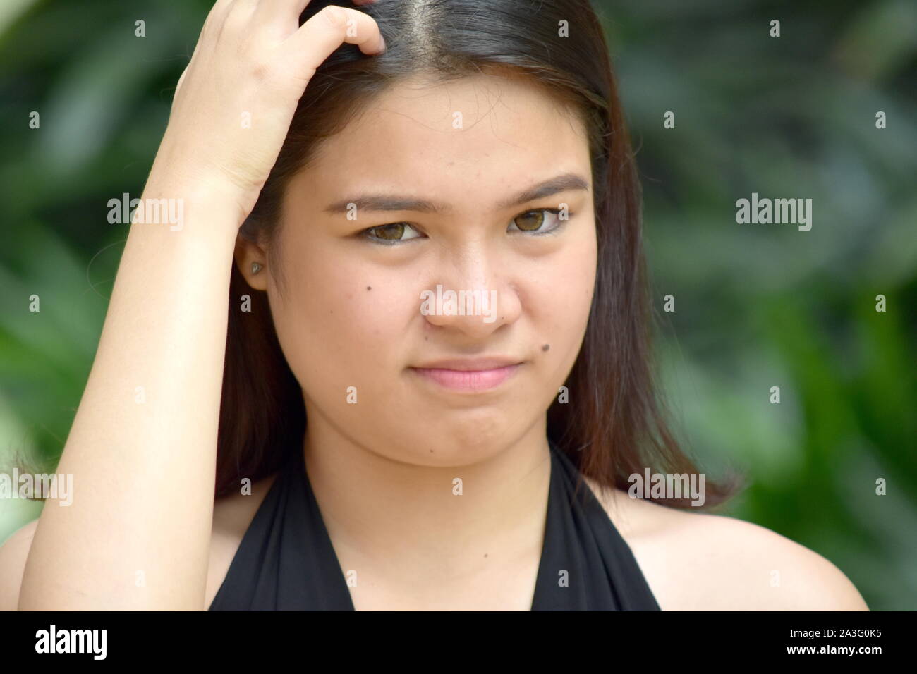 A Confused Adult Female Stock Photo - Alamy