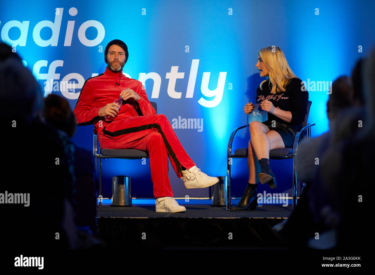 Talking on stage hi-res stock photography and images - Alamy