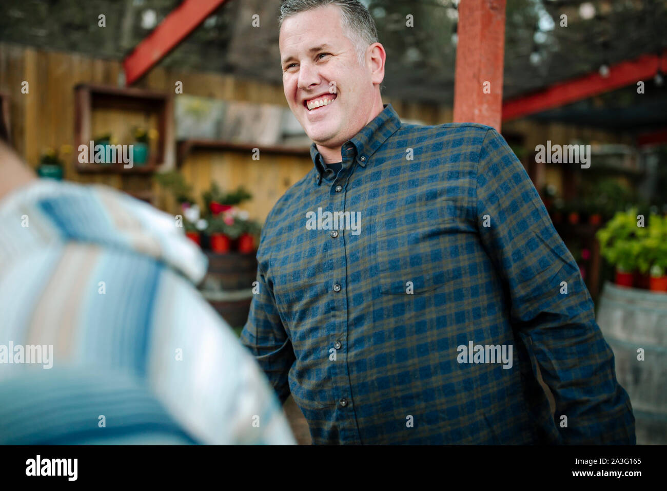 Laughing man in plaid shirt hi-res stock photography and images - Alamy