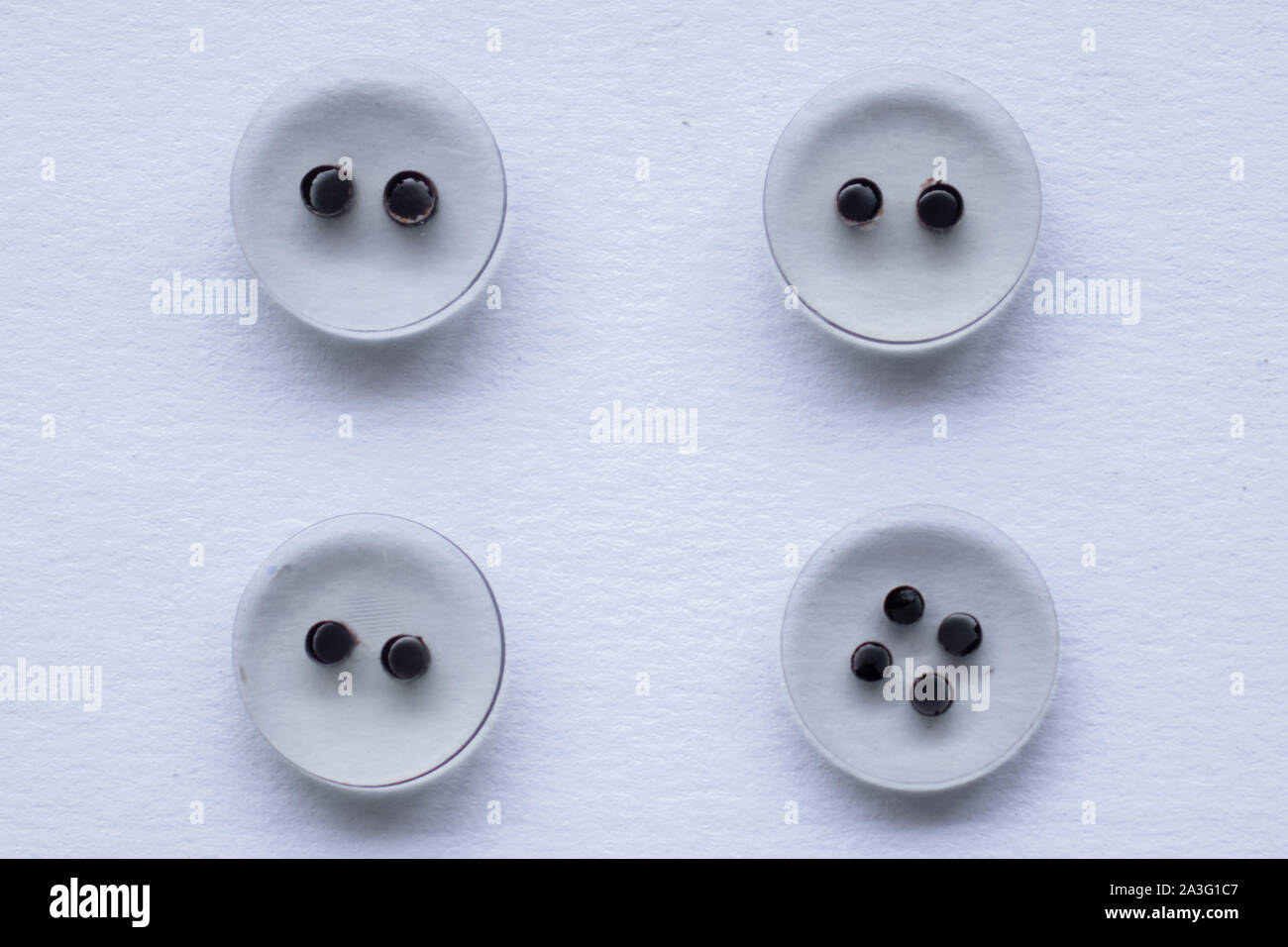 Yellow sewing button pattern hi-res stock photography and images - Alamy